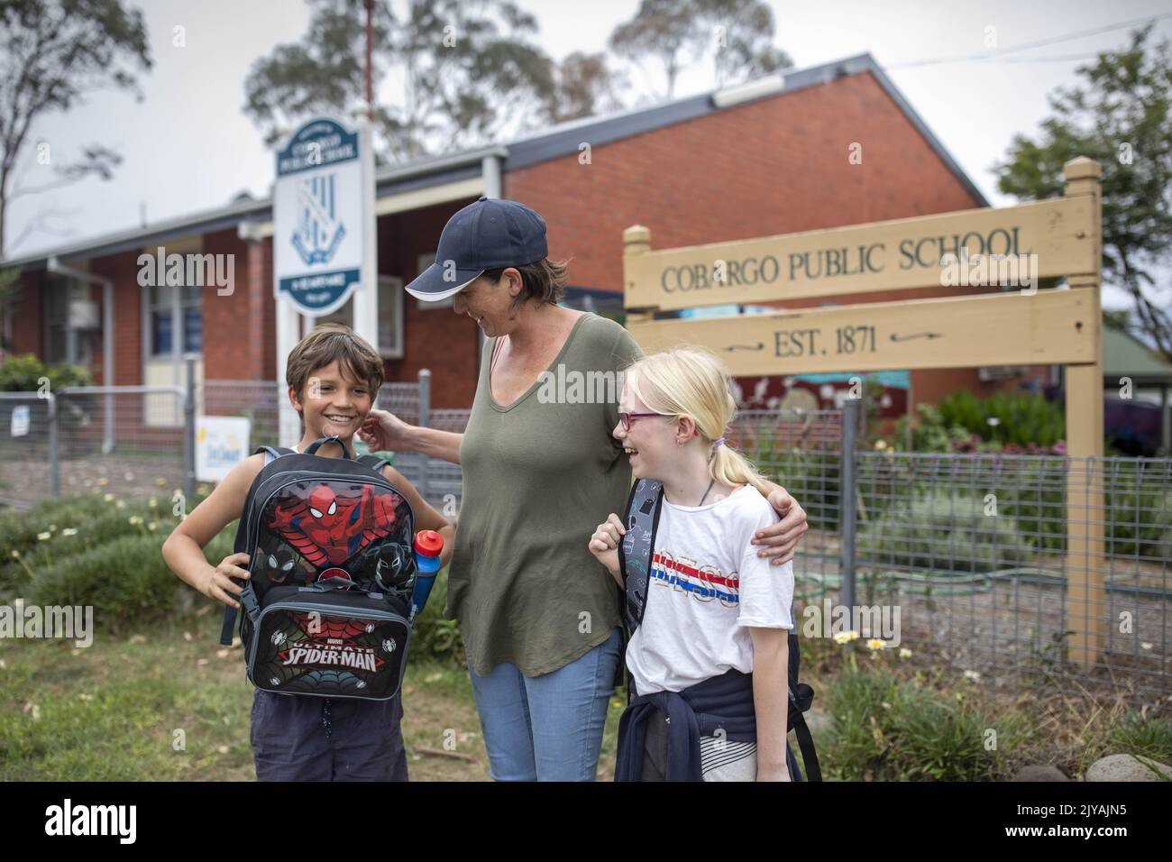 Clare Rugendyke and children Fletcher, 8, (left) and Marley, 10, pose ...