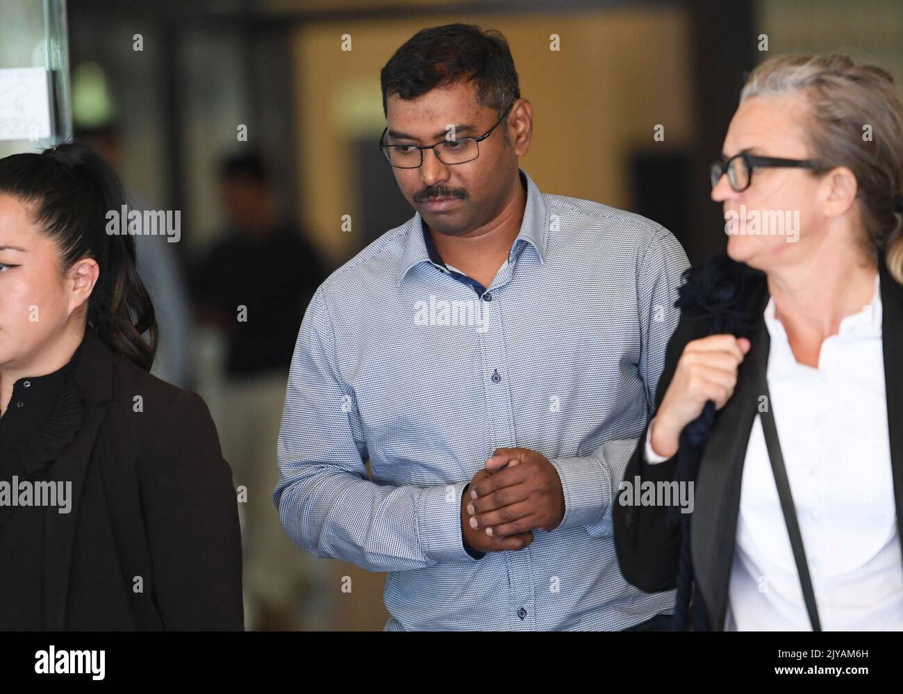 Courier driver Dinkar Tayi leaves the Downing Centre Local Court in ...