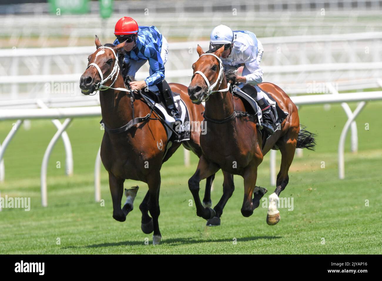 Jockey Tommy Berry rides Youngstar (left) and Jockey Nash Rawiller ...