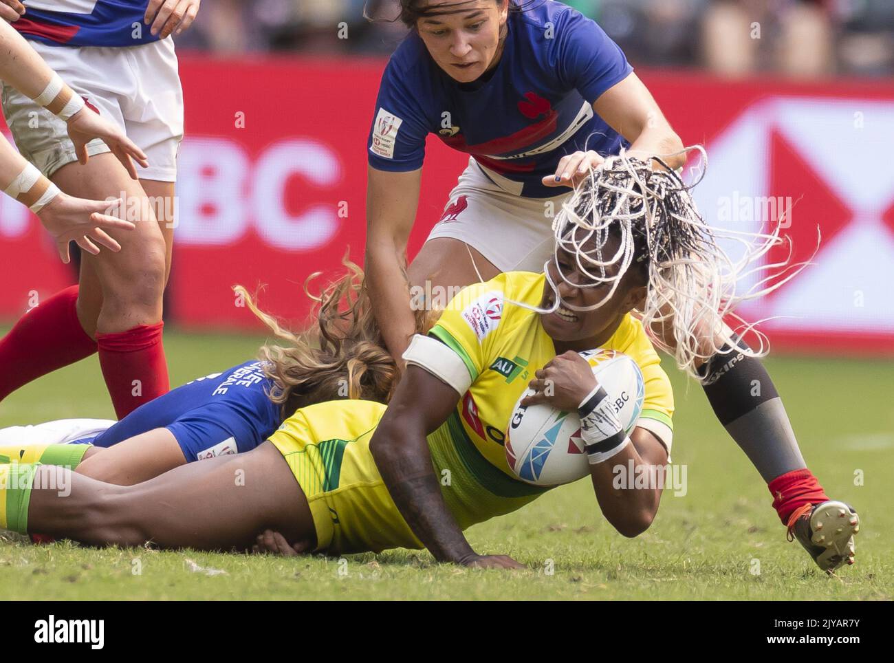 Ellia Green of Australia is tackled during day two of the Sydney 7S ...
