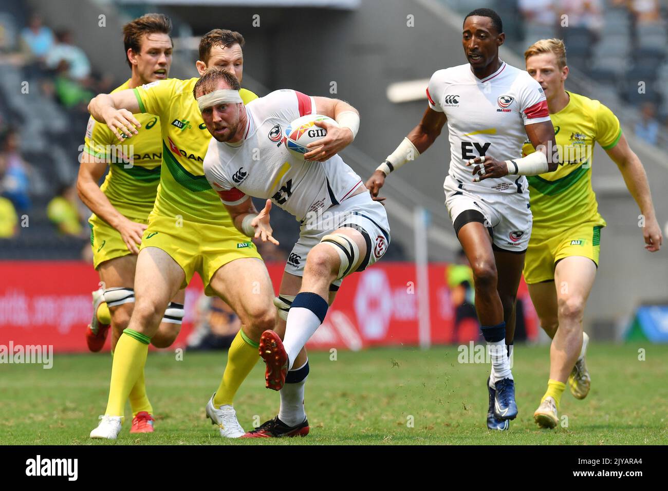 Ben Pinkelman of the USA evades Australia's defence during day two of ...