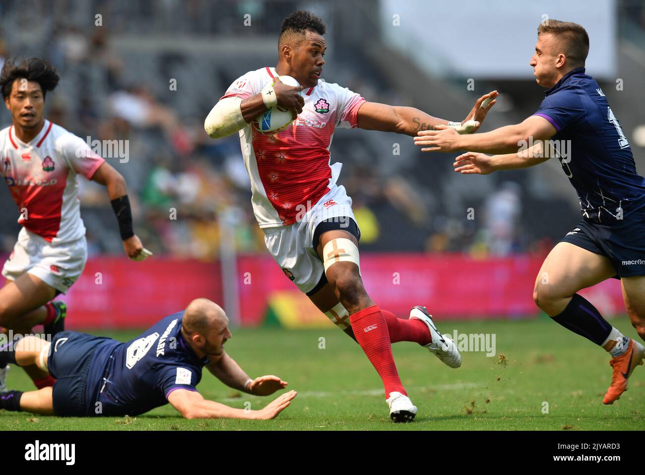 Jose Seru of Japan tires to fend off Ross McCann of Scotland during day ...