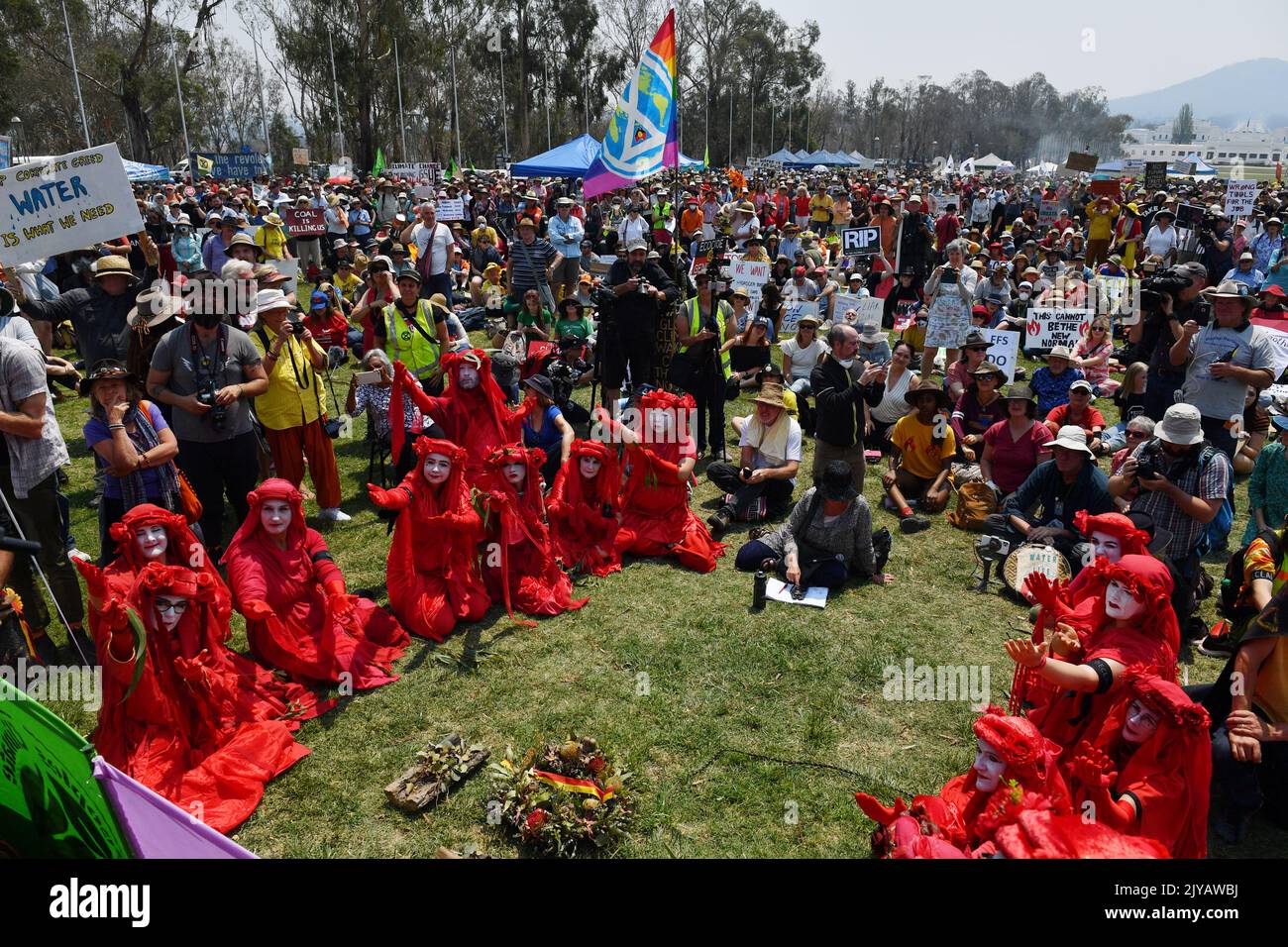 Climate change activists protest outside Parliament House in Canberra ...