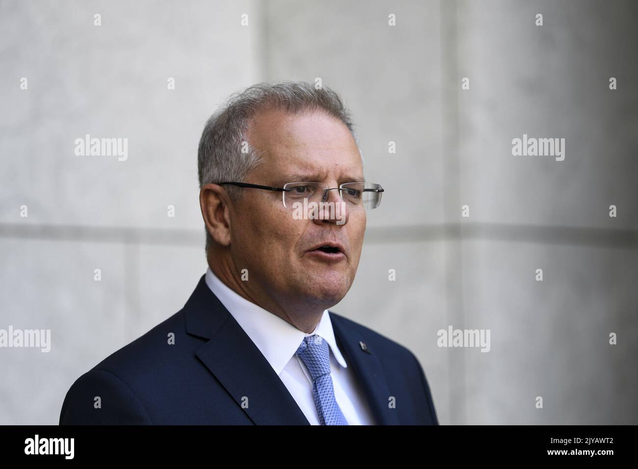 Australian Prime Minister Scott Morrison (right) speaks during a press ...