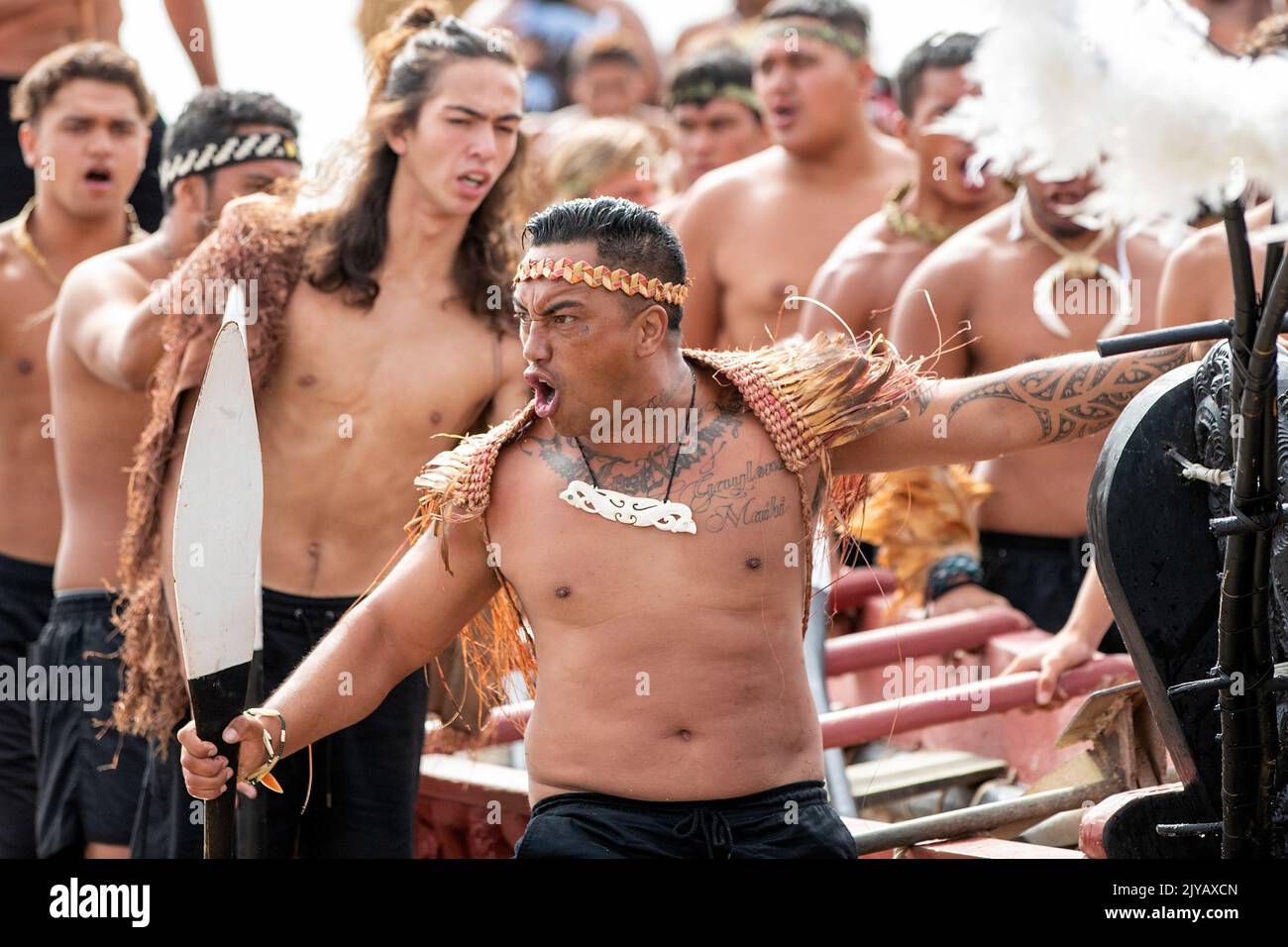 Traditional waka crews perform a haka on Te Tii beach after they ...
