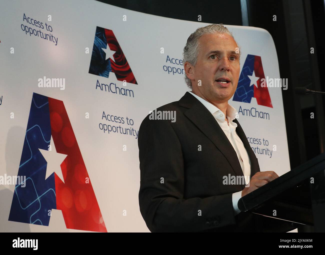 Telstra CEO Andy Penn addresses the AmCham lunch at the RACV Club in ...