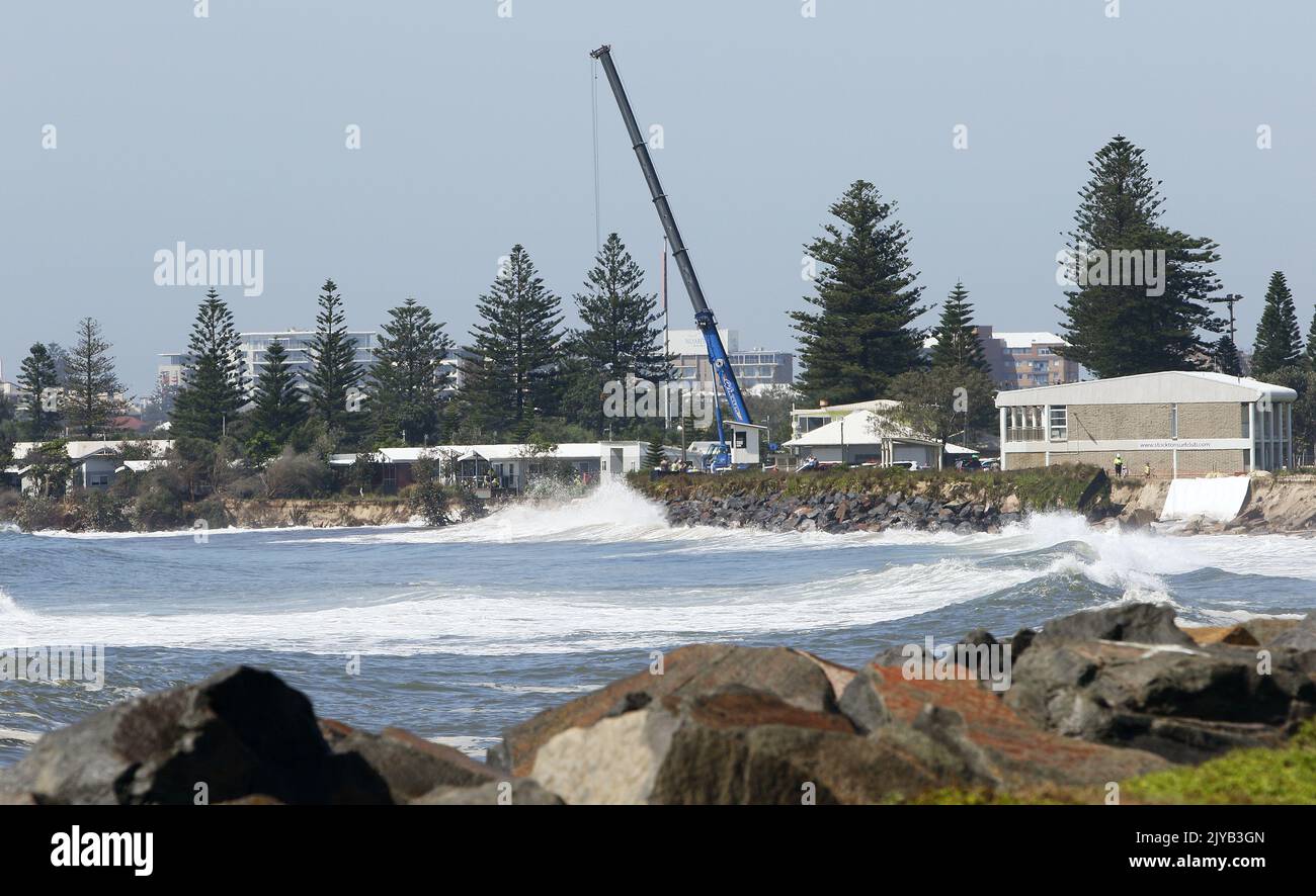 Newcastle City Council use a crane to move cabins from the council ...