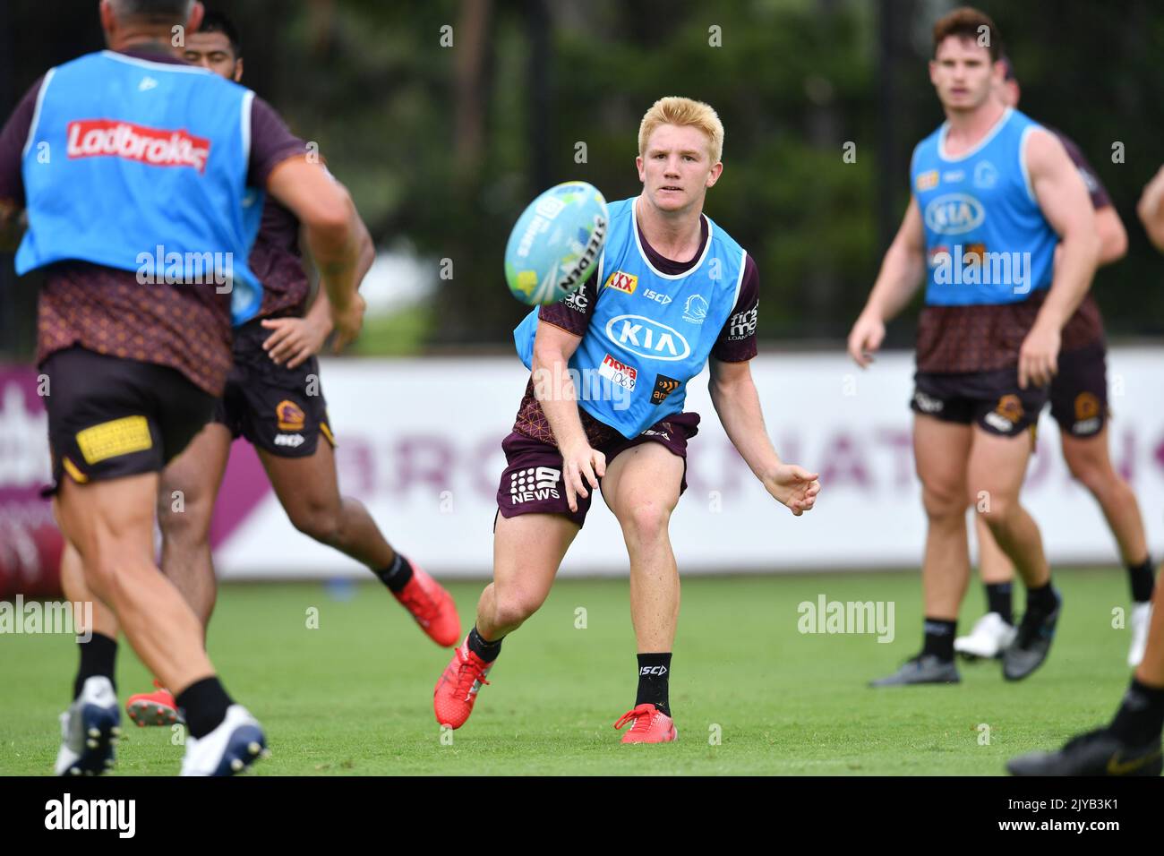 Tom Dearden (centre) in action during Brisbane Broncos training at ...