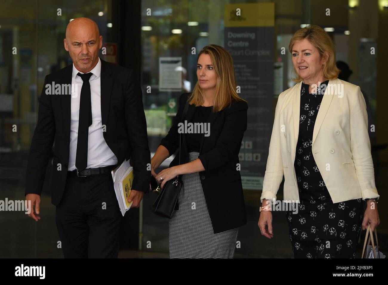 Gary Jubelin (left) leaves the Downing Centre Local Court in Sydney ...