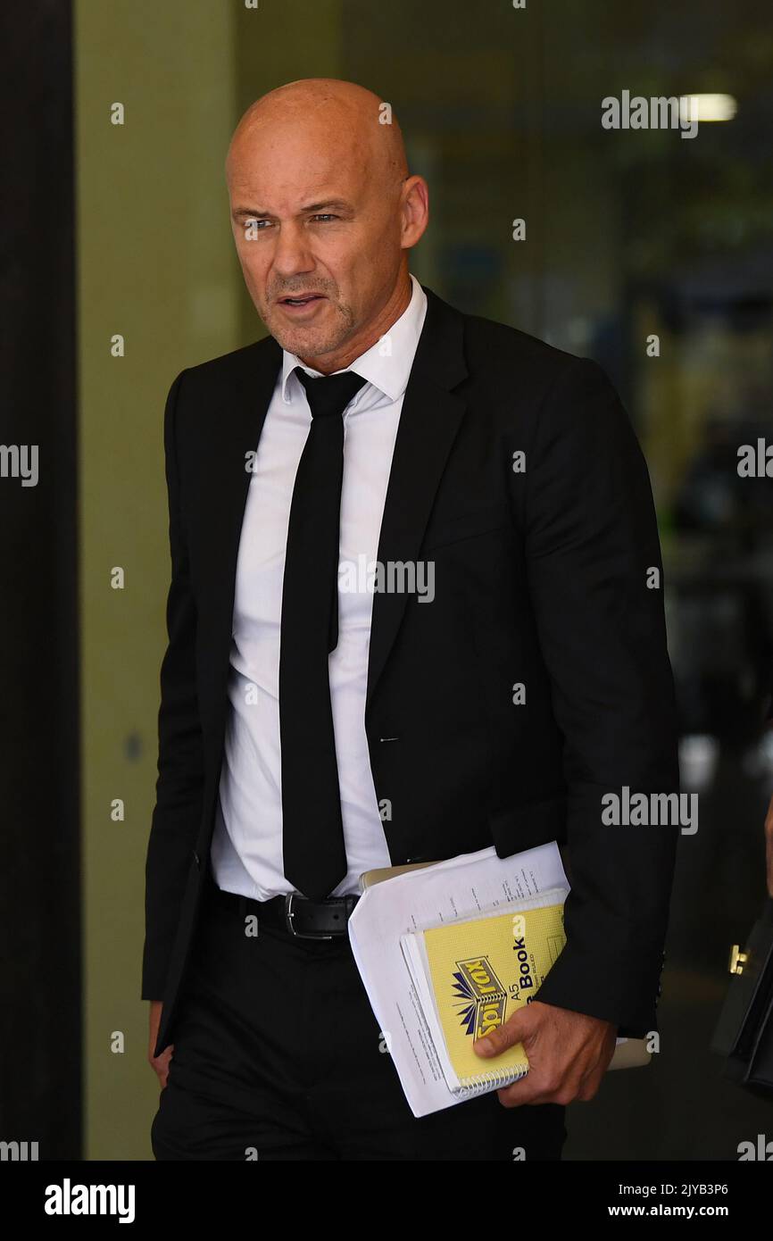 Gary Jubelin leaves the Downing Centre Local Court in Sydney, Tuesday ...
