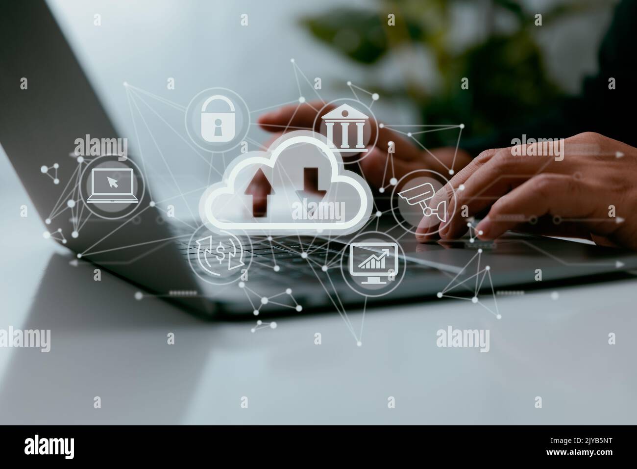 With a cloud computing diagram in hand, a man uses his laptop. Infrastructural principles such ...