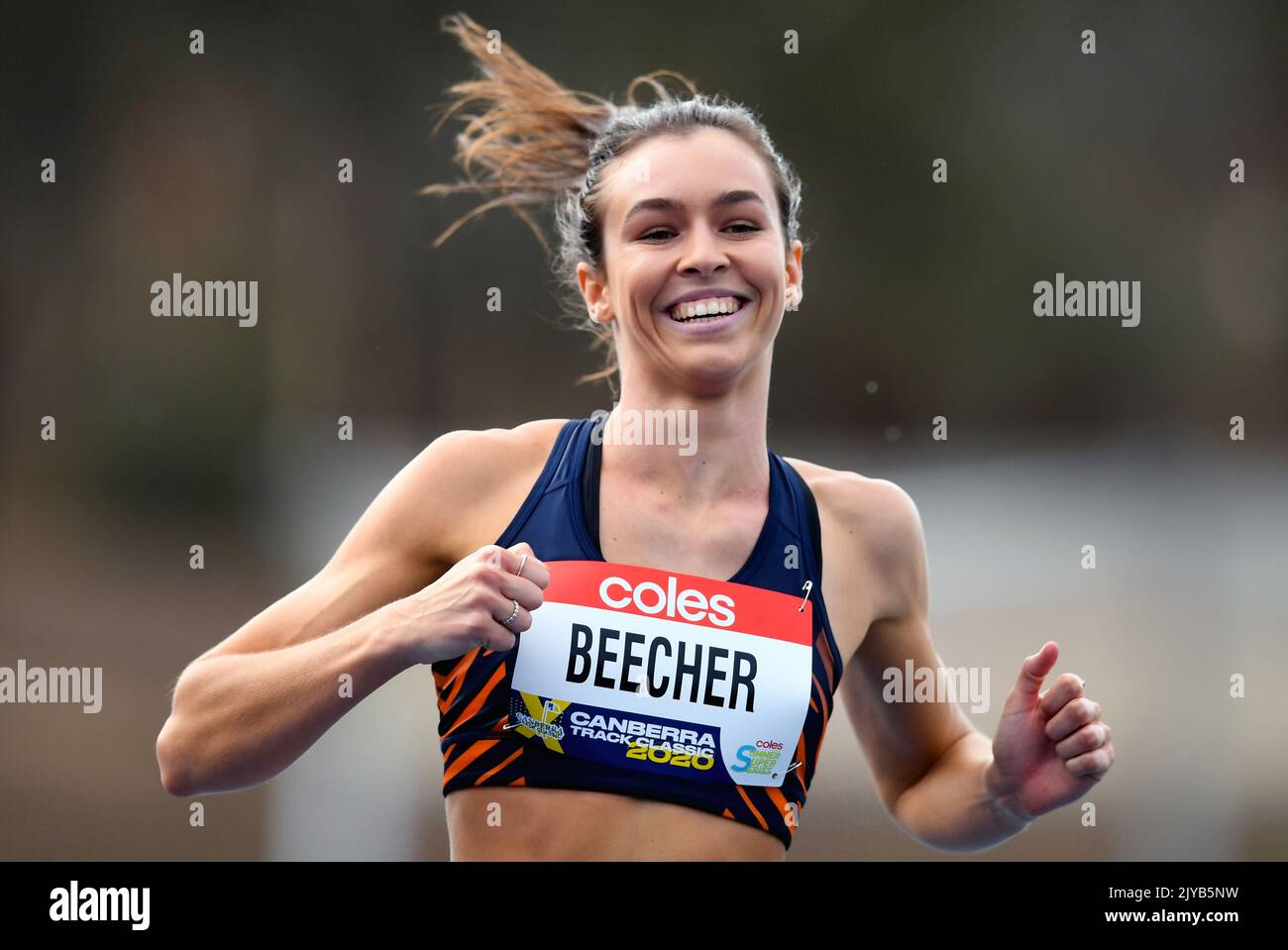 Jacinta Beecher of Queensland reacts after winning the Women 200m Open ...