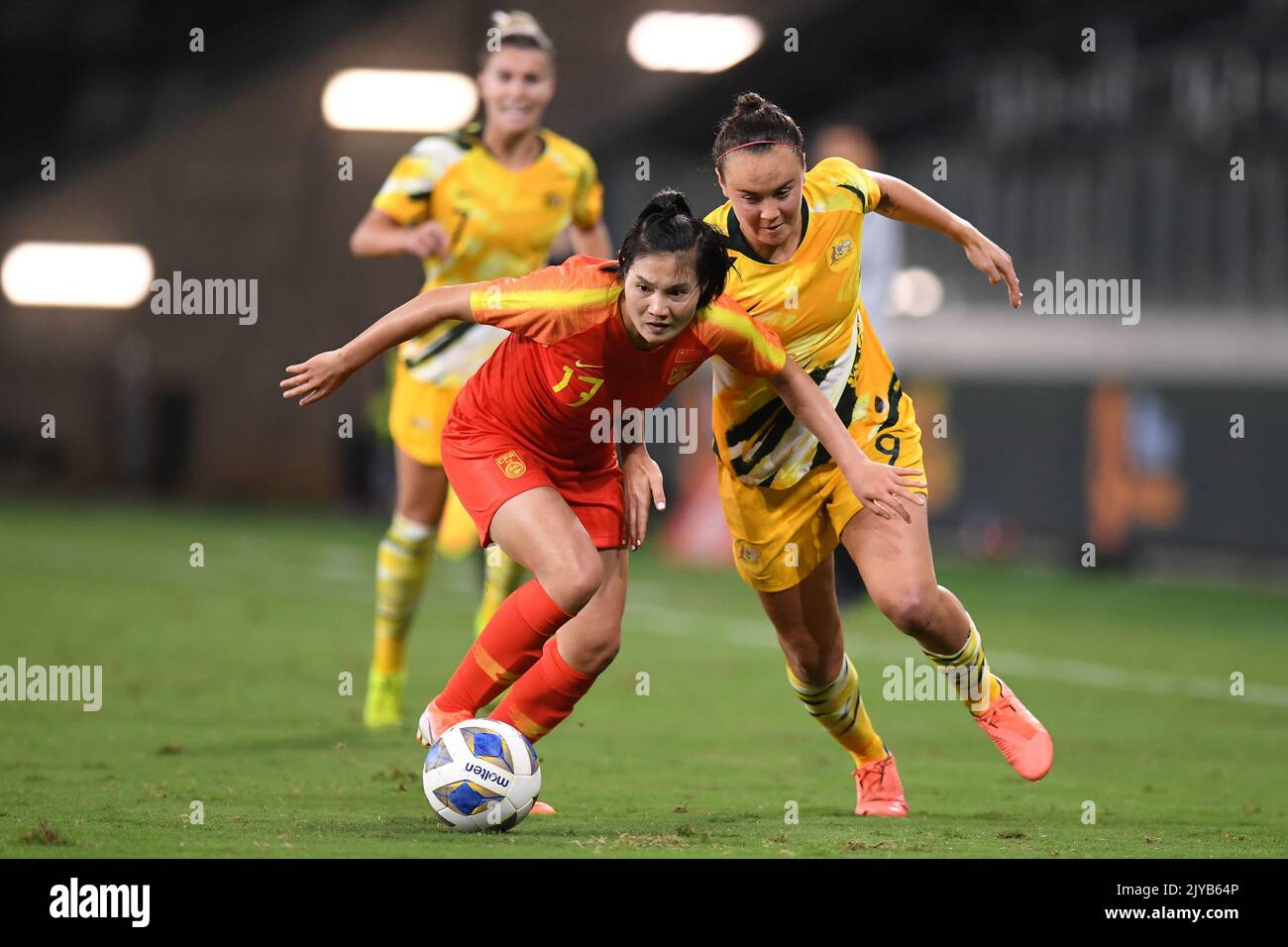 Luo Guiping of China holds back Caitlin Foord of Australia during the ...
