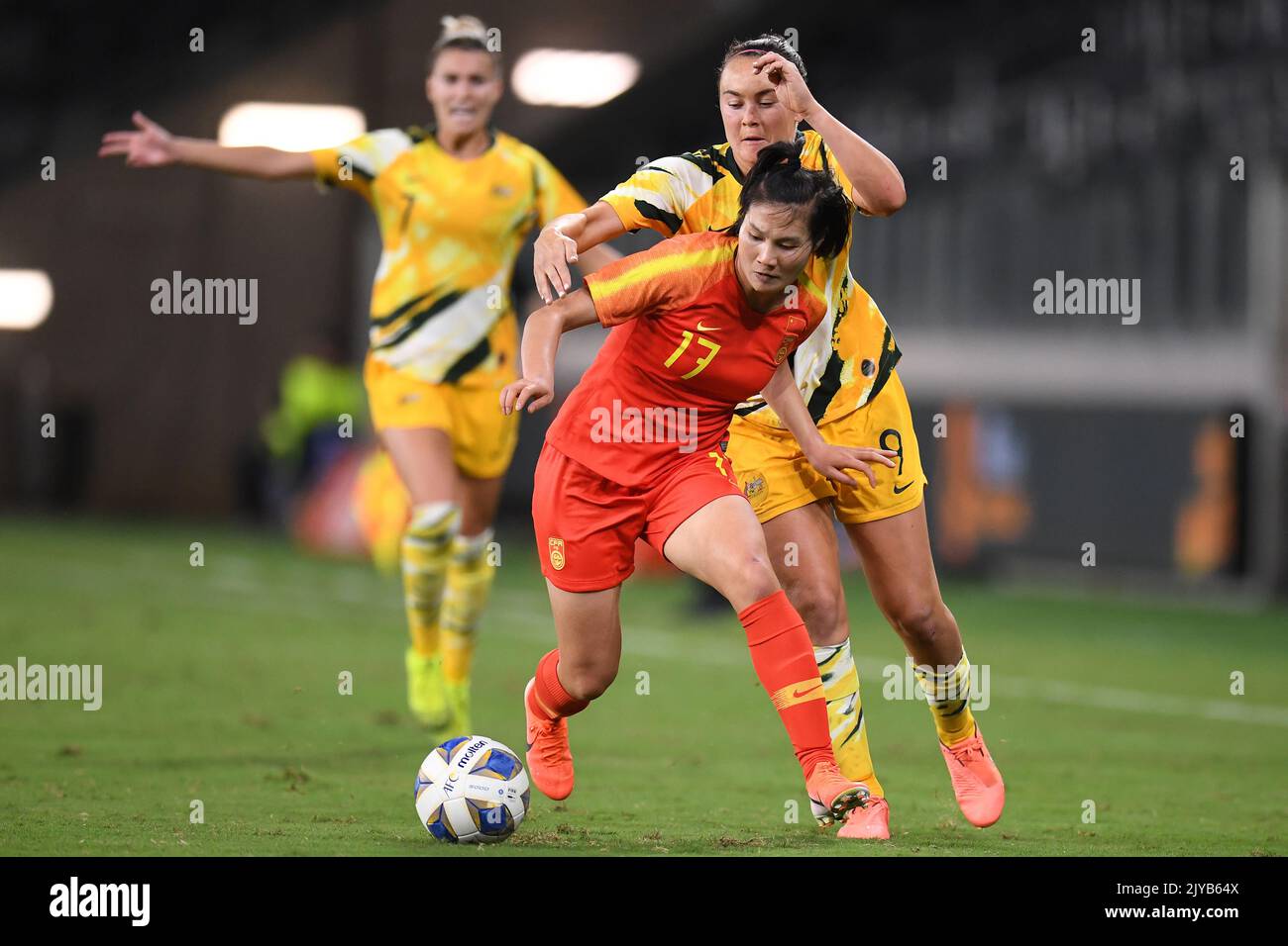 Luo Guiping of China holds back Caitlin Foord of Australia during the ...