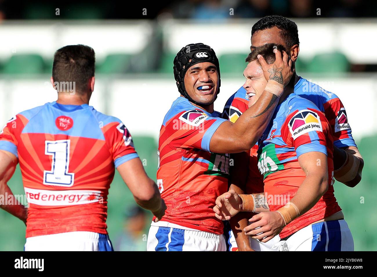 Brodie Jones (right) of the Knights is congratulated by teammates after ...