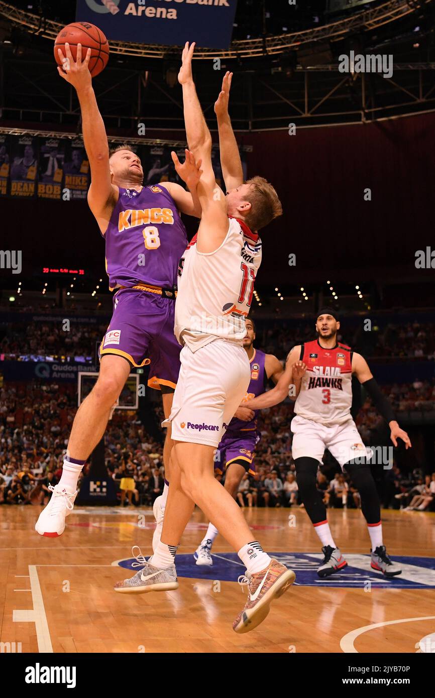 Brad Newley of the Kings scores over Daniel Grida of the Hawks during ...