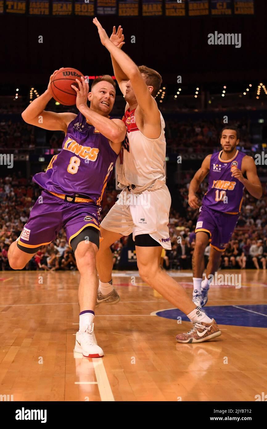 Brad Newley of the Kings and Daniel Grida of the Hawks during the Round ...