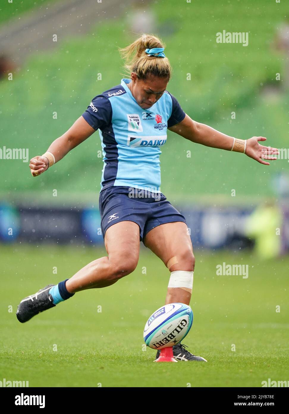 Pauline Piliae of the Waratahs kicks a is conversion during the Round 1 ...
