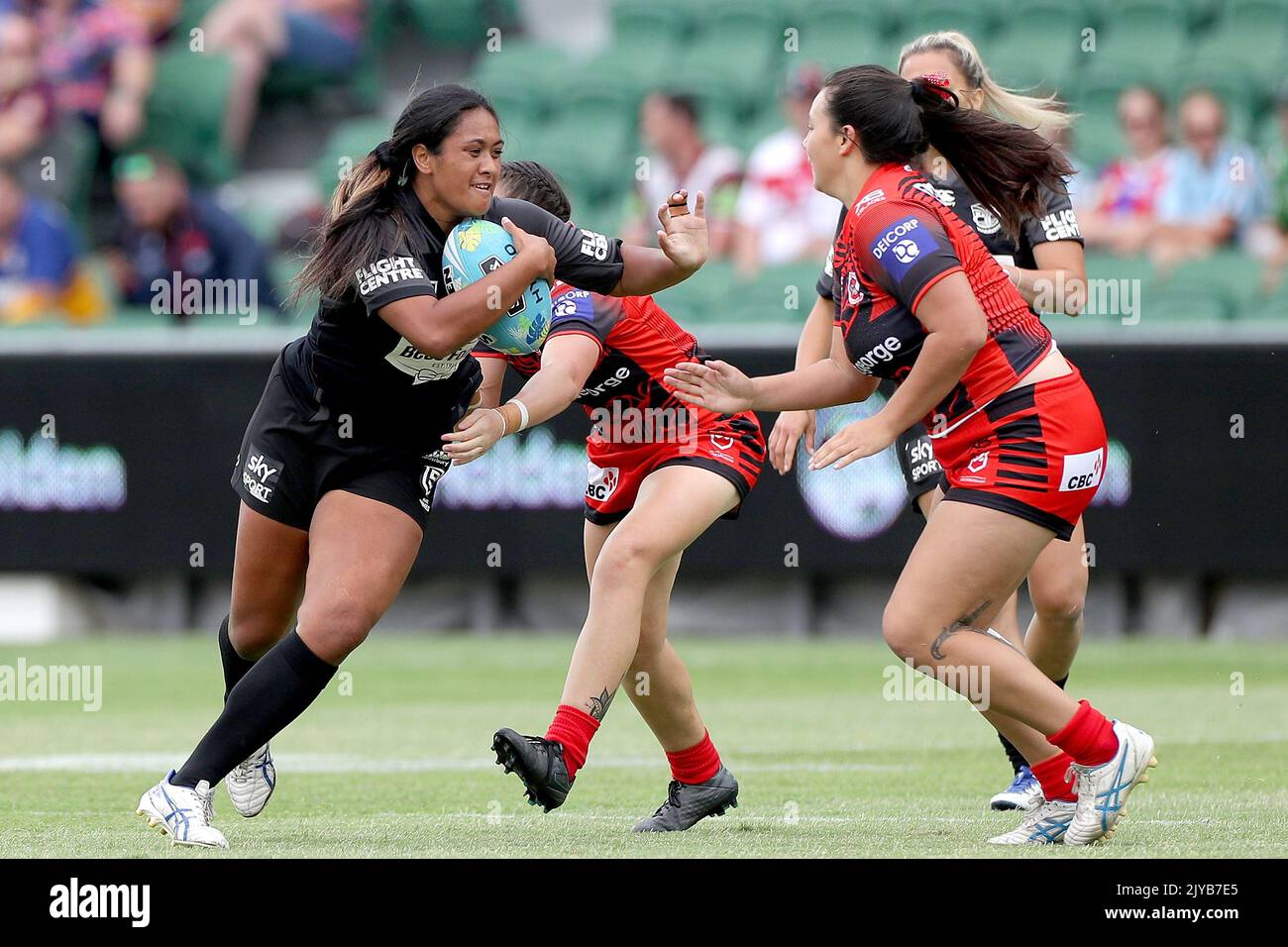 Crystal Tamarua of the Warriors pushes off Maddison Weatherall of the ...