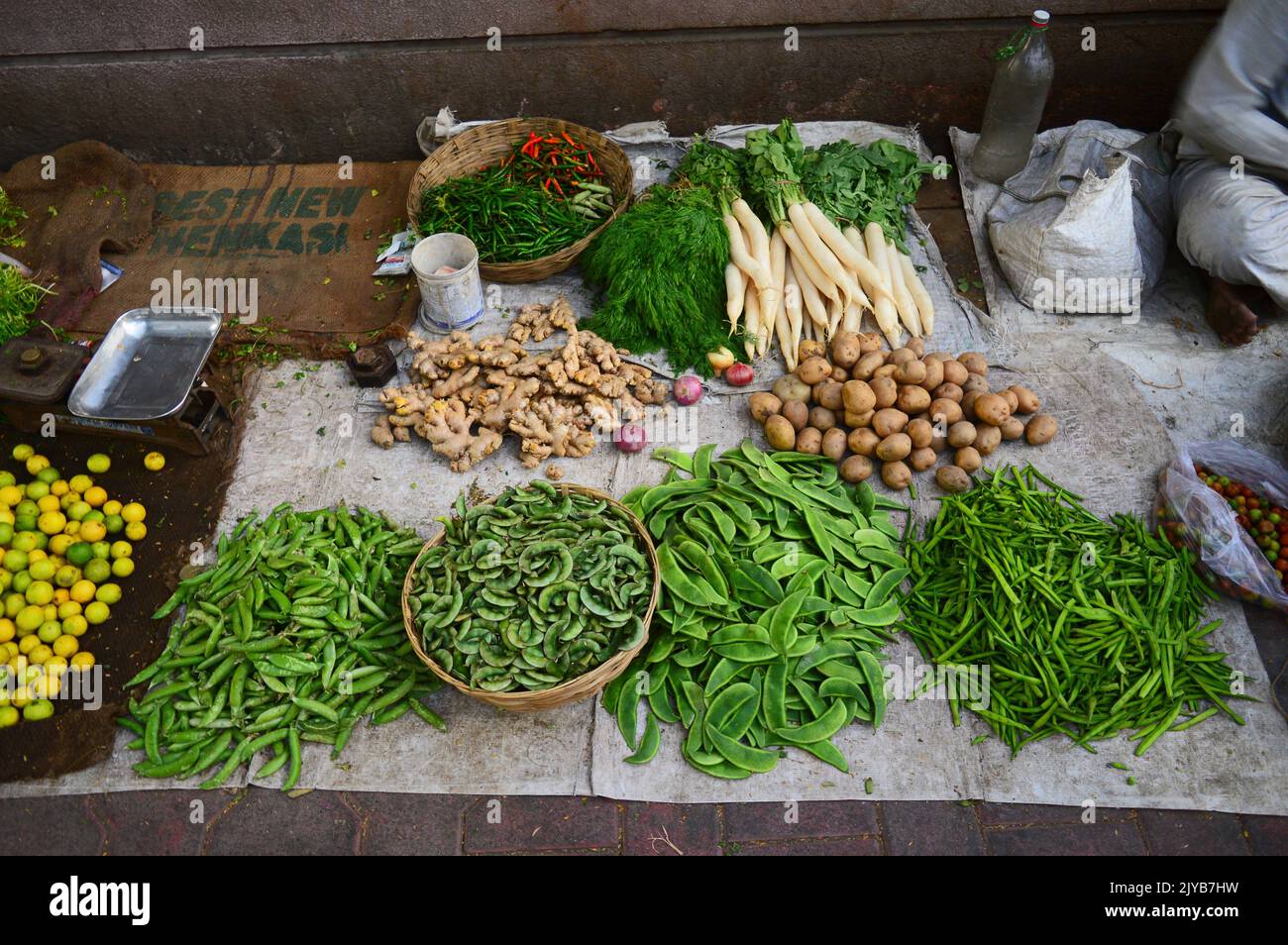 Vegetable stall selling ginger, onions, beans , carrots and others ...