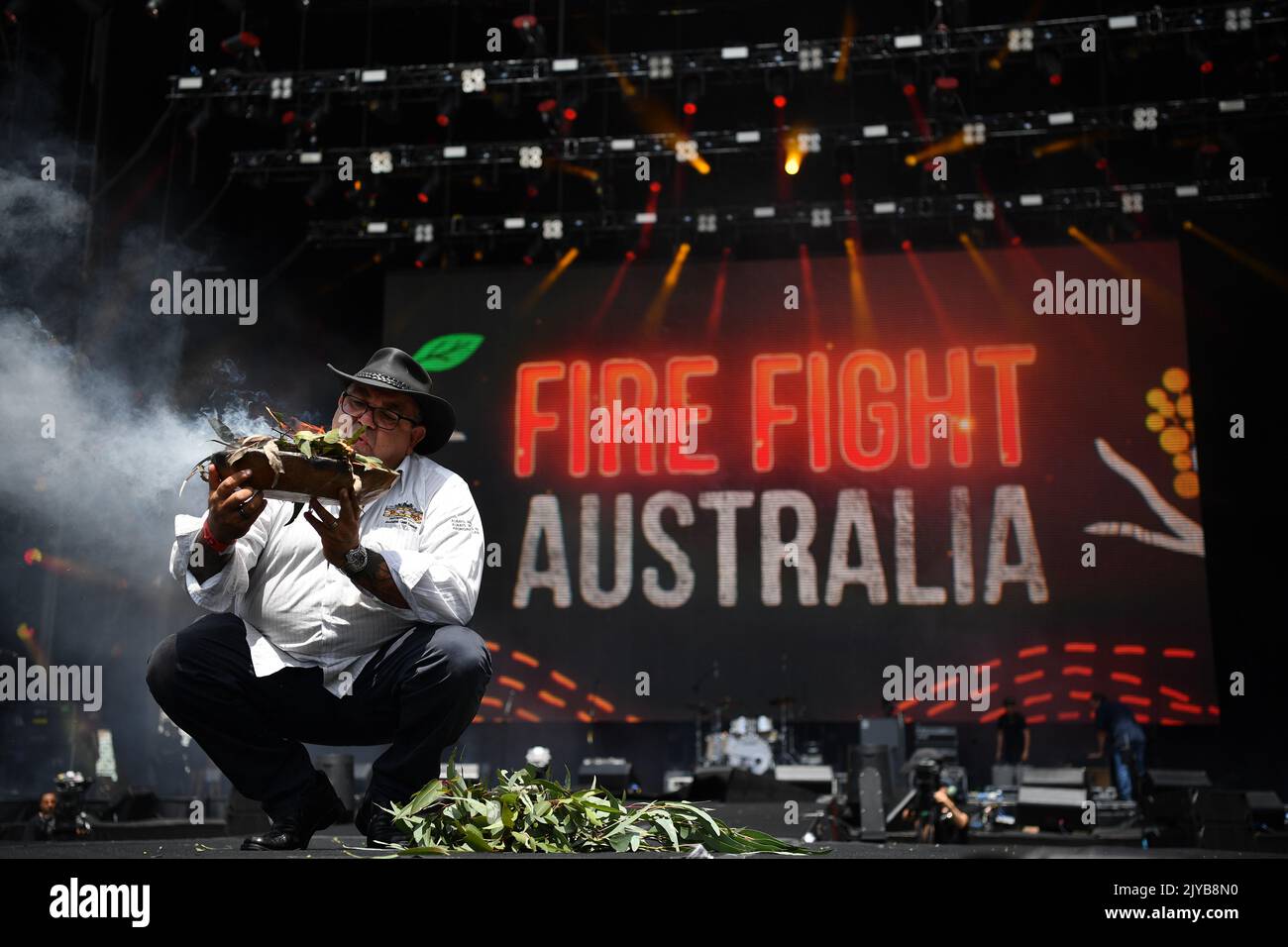 A traditional smoking ceremony during the Fire Fight Australia bushfire ...