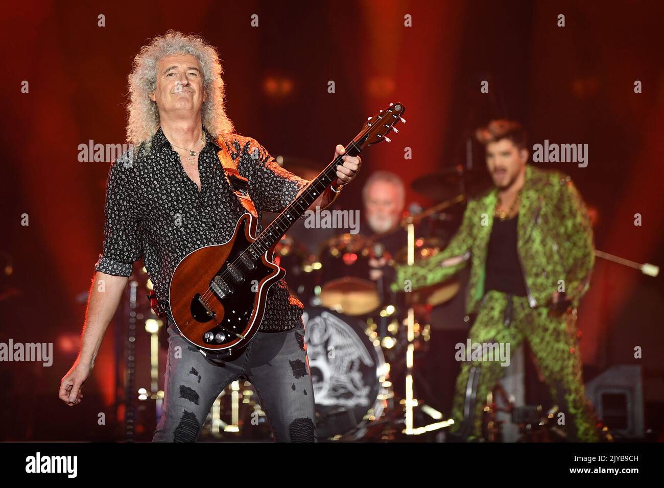 Brian May (left) and Adam Lambert of Queen performs during the Fire ...