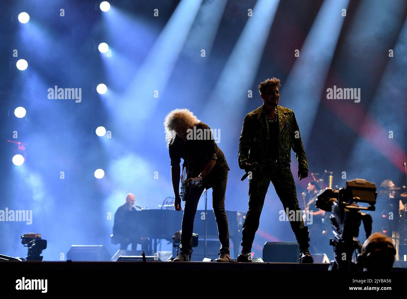 Brian May (right) and Adam Lambert of Queen performs during the Fire ...