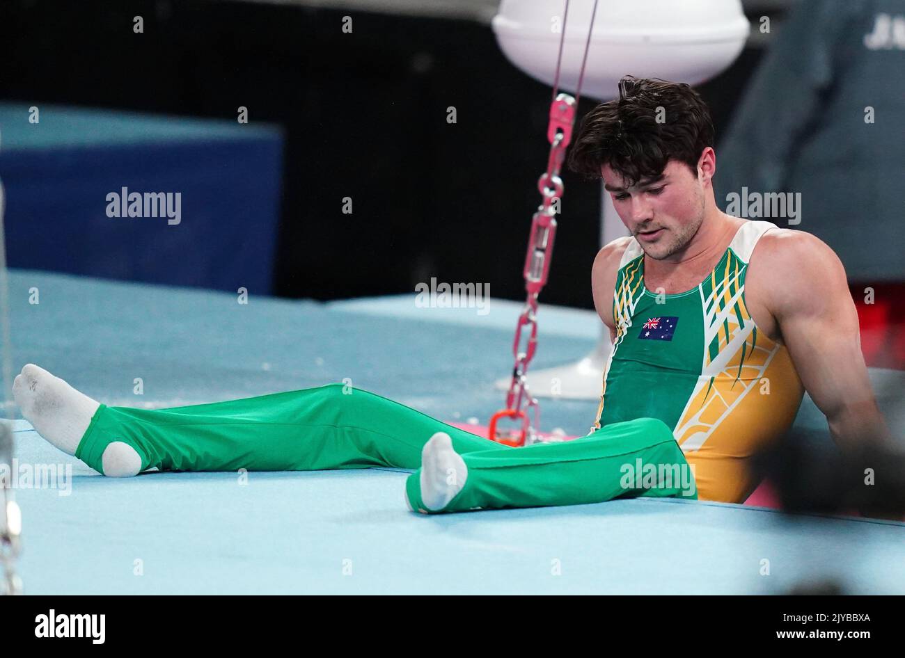 Clay Mason Stephens of Australia falls to the ground injured after ...