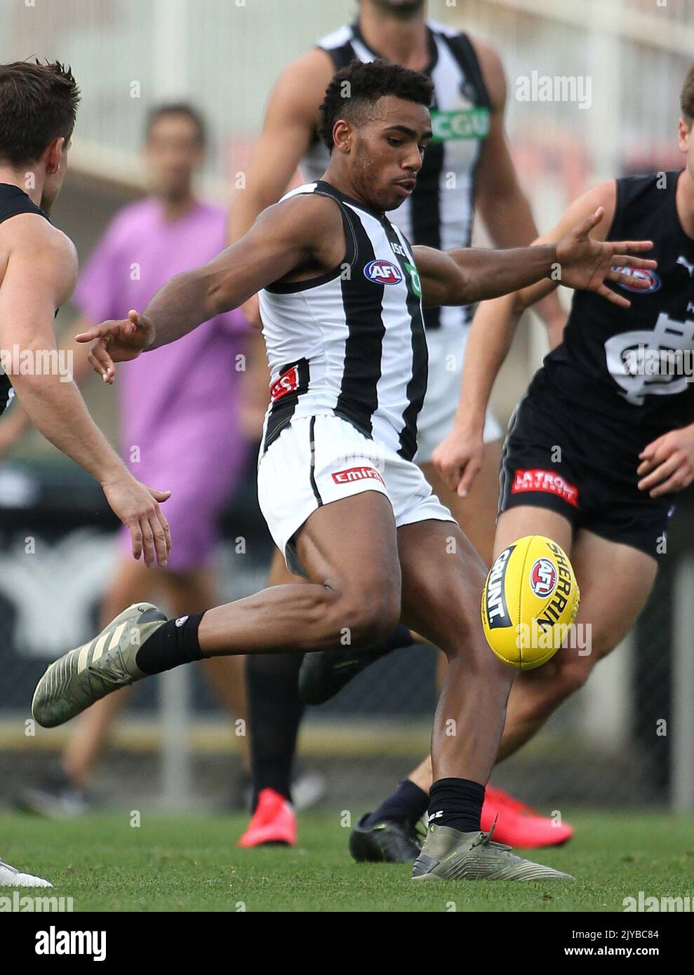Isaac Quaynor of the Magpies in action during the AFL pre-season ...