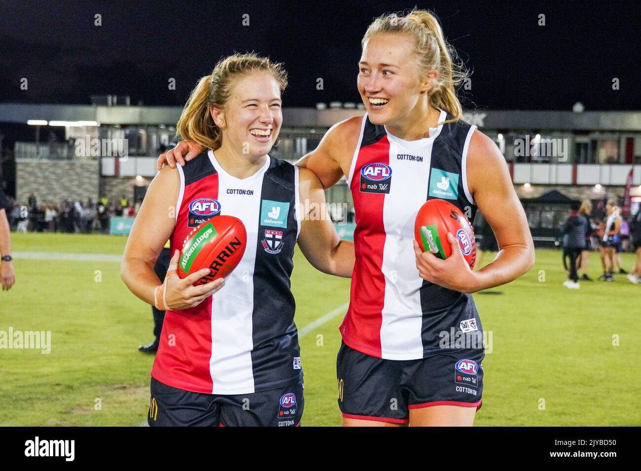 Rosie Dillon and Alison Brown of the Saints celebrate winning the Round ...