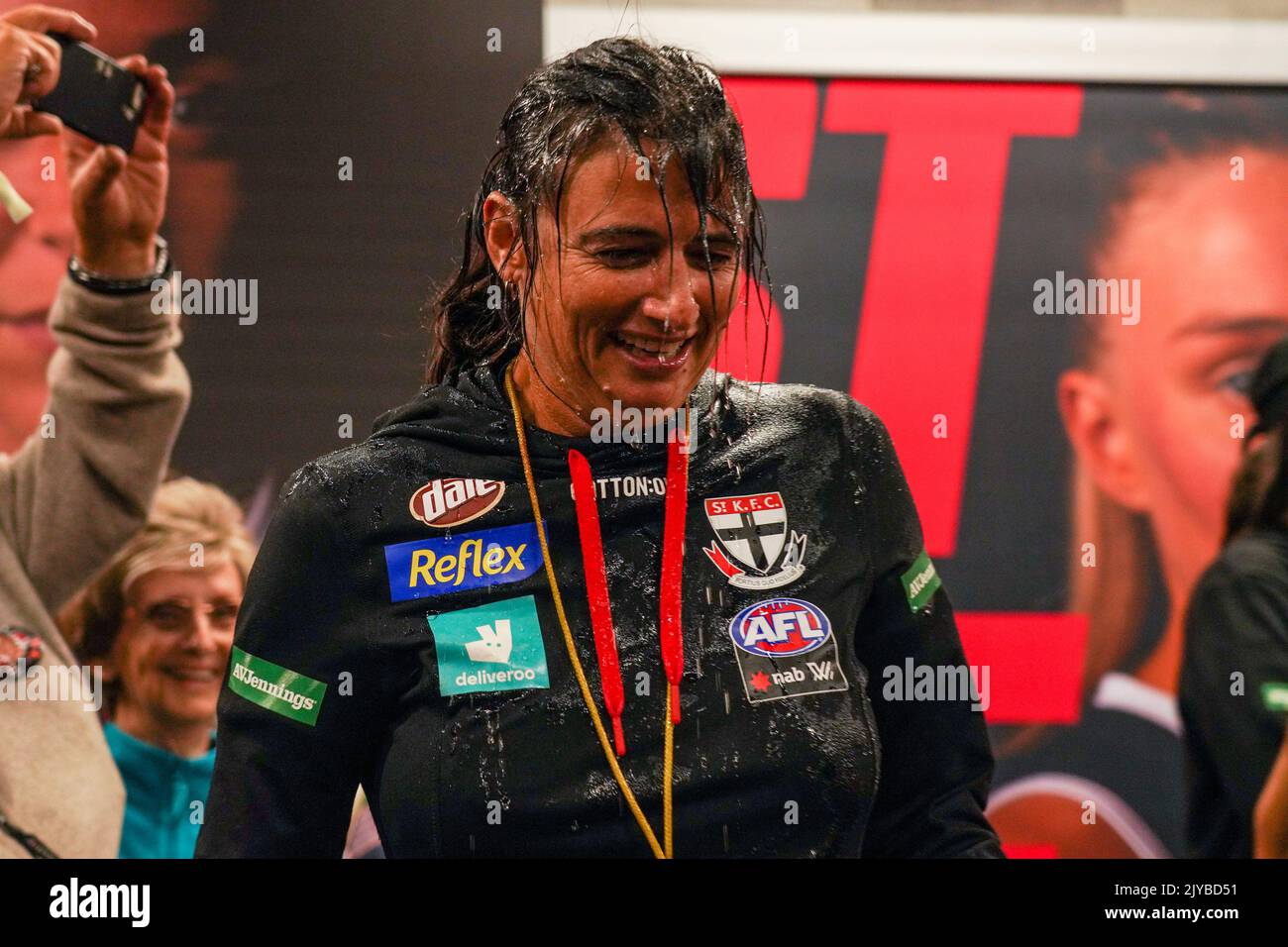 Saints Coach Peta Searle gets a celebratory drenching after winning the ...