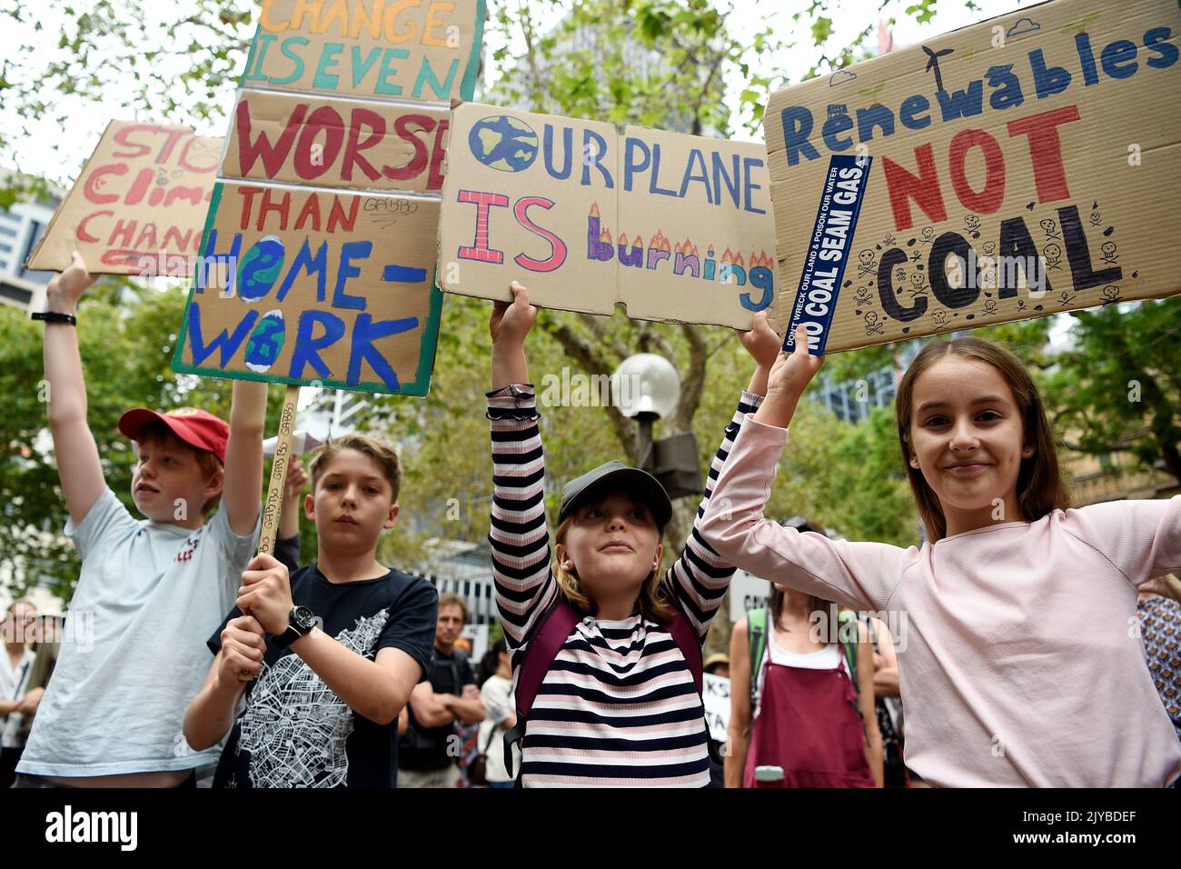 Protesters hold placards during the Climate Crisis National Day of ...