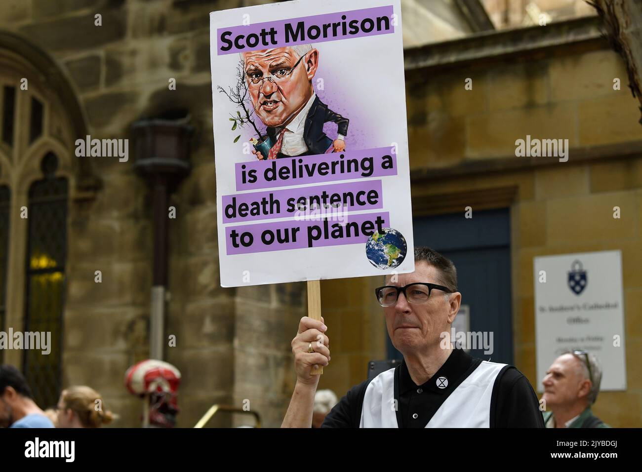 Protesters hold placards during the Climate Crisis National Day of ...