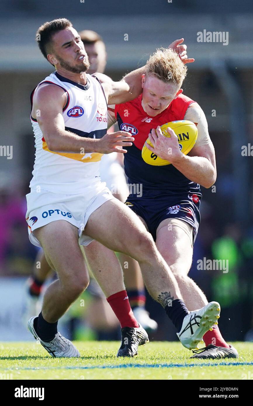 Lachlan Murphy of the Crows tackles Clayton Oliver of the Demons during ...