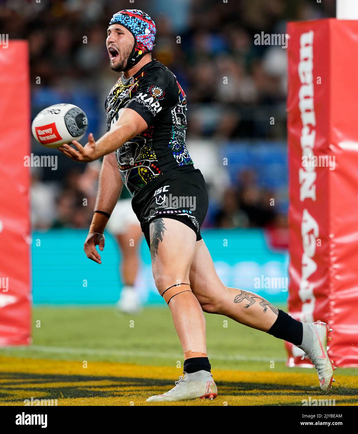 Josh Curran of the Indigenous All Stars celebrates after scoring his ...