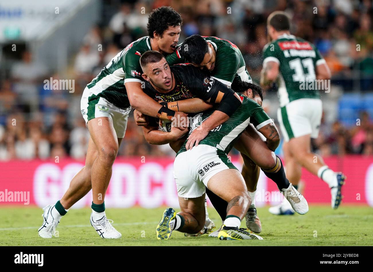 Zac Saddler of the Indigenous All Stars is tackled during the NRL ...