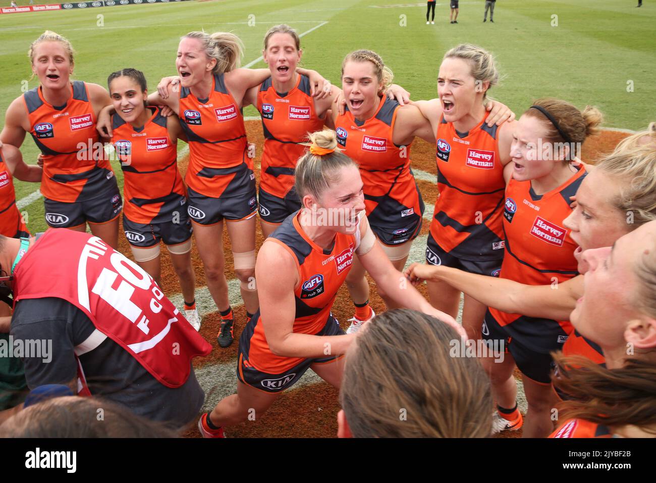 Lisa Steane of the Giants leads the team song after their win during ...
