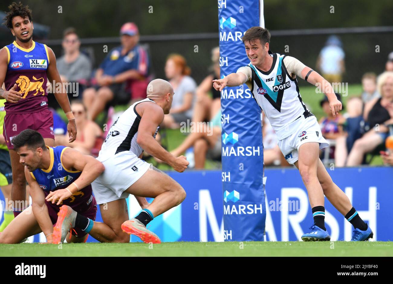 Zak Butters (right) of the Power celebrates kicking a goal with Sam ...
