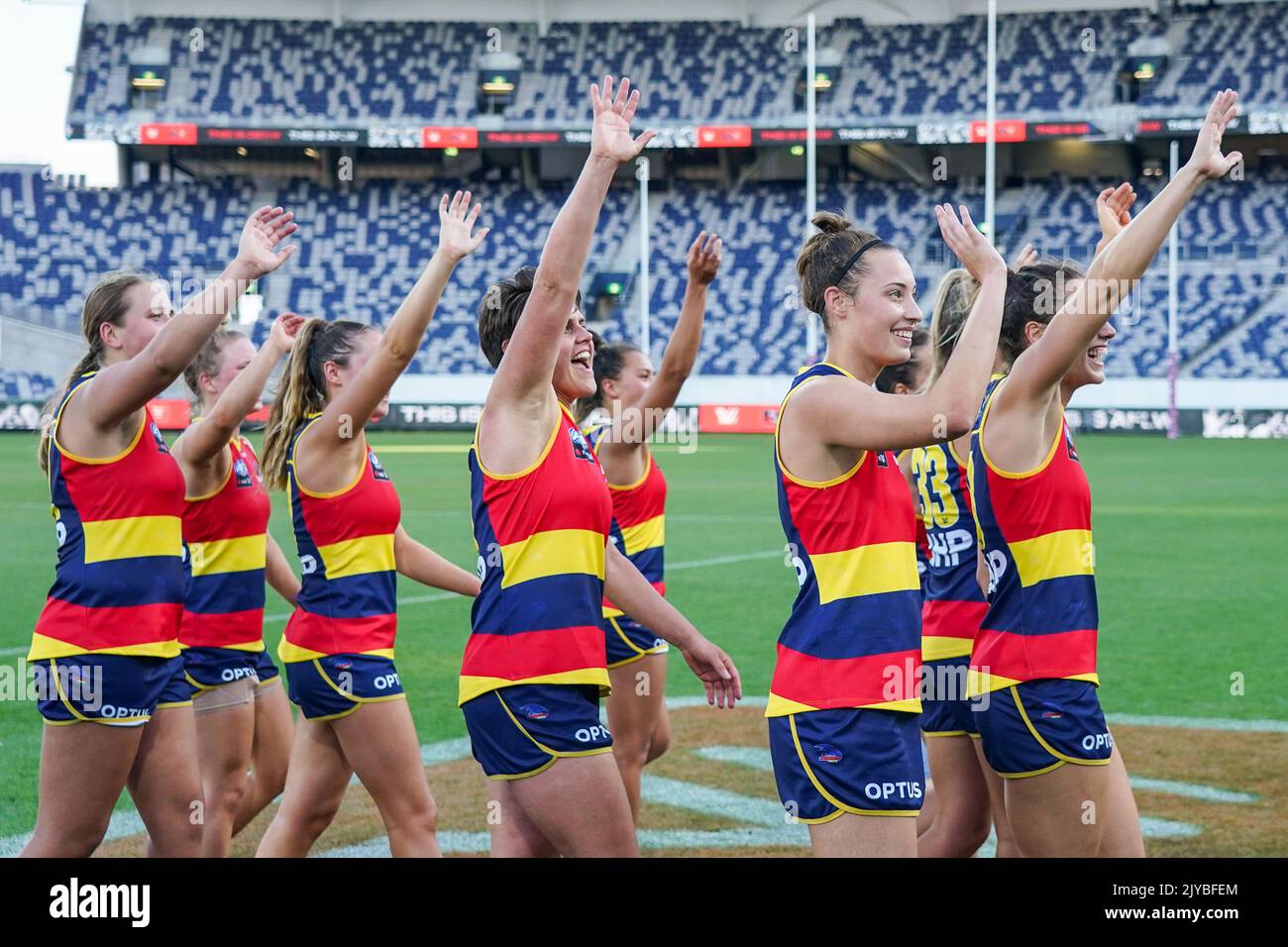Crows players wave to the crowd after winning the Round 3 AFLW match ...