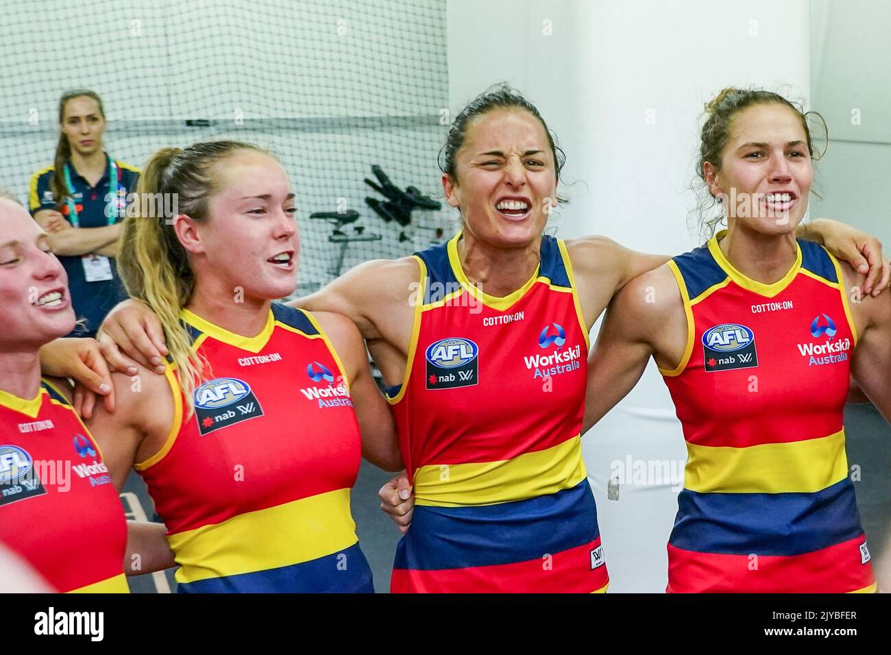 Crows players sing the song after winning the Round 3 AFLW match ...