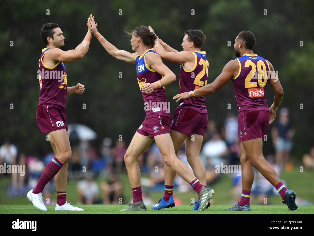 Stefan Martin (left) of the Lions celebrates kicking a goal with team ...