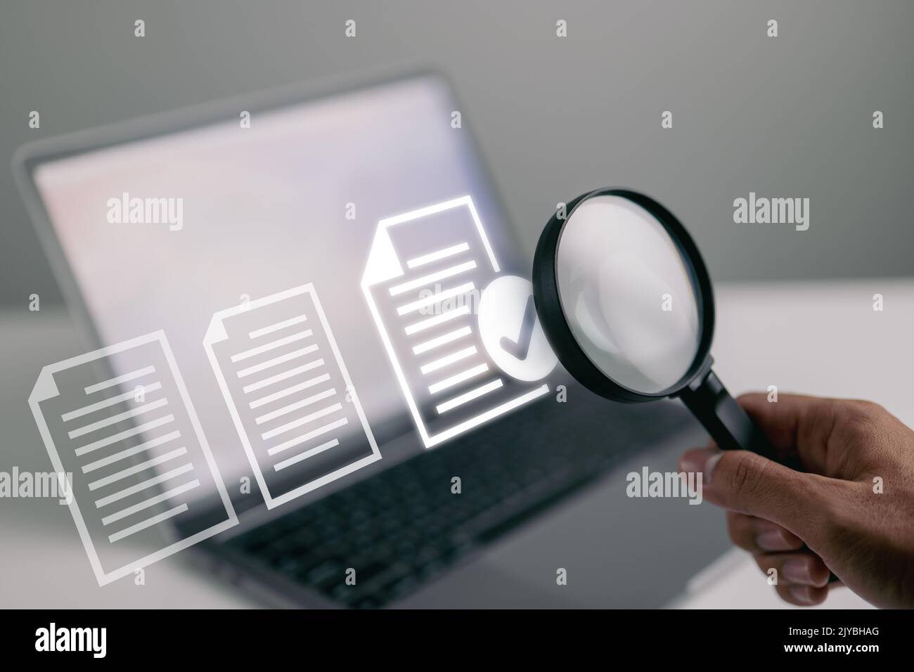 Documents and magnifying glass. Confirmed or approved document on ...