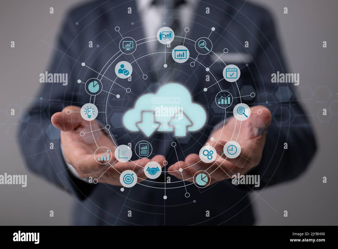 rt and graph icons on a digital screen interface and a businessman in ...