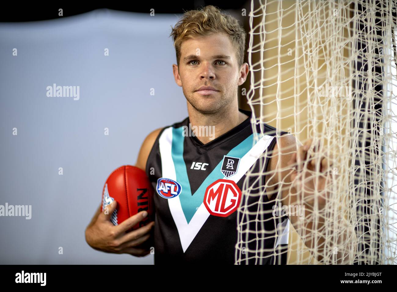 AFL Port Adelaide Player Dan Houston poses for a portrait at the Port ...