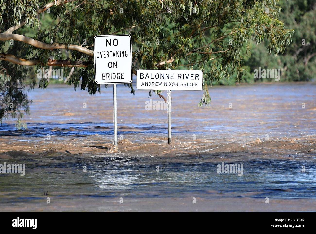 The swollen Balonne river floods the Andrew Nixon bridge in St George ...