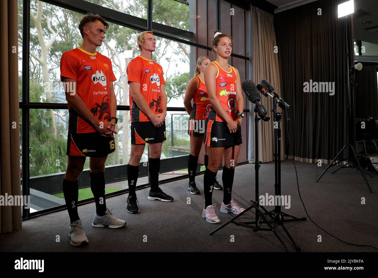 Brooke Peris of the Hockeyroos speaks to the media as Tim Howard and ...
