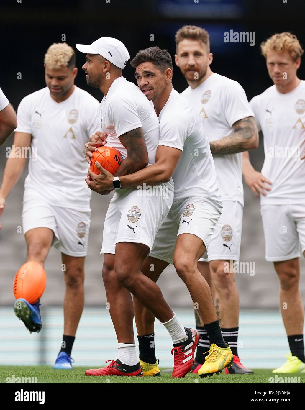 Charlie Cameron tackles Bradley Hill of the All-Stars during a joint ...