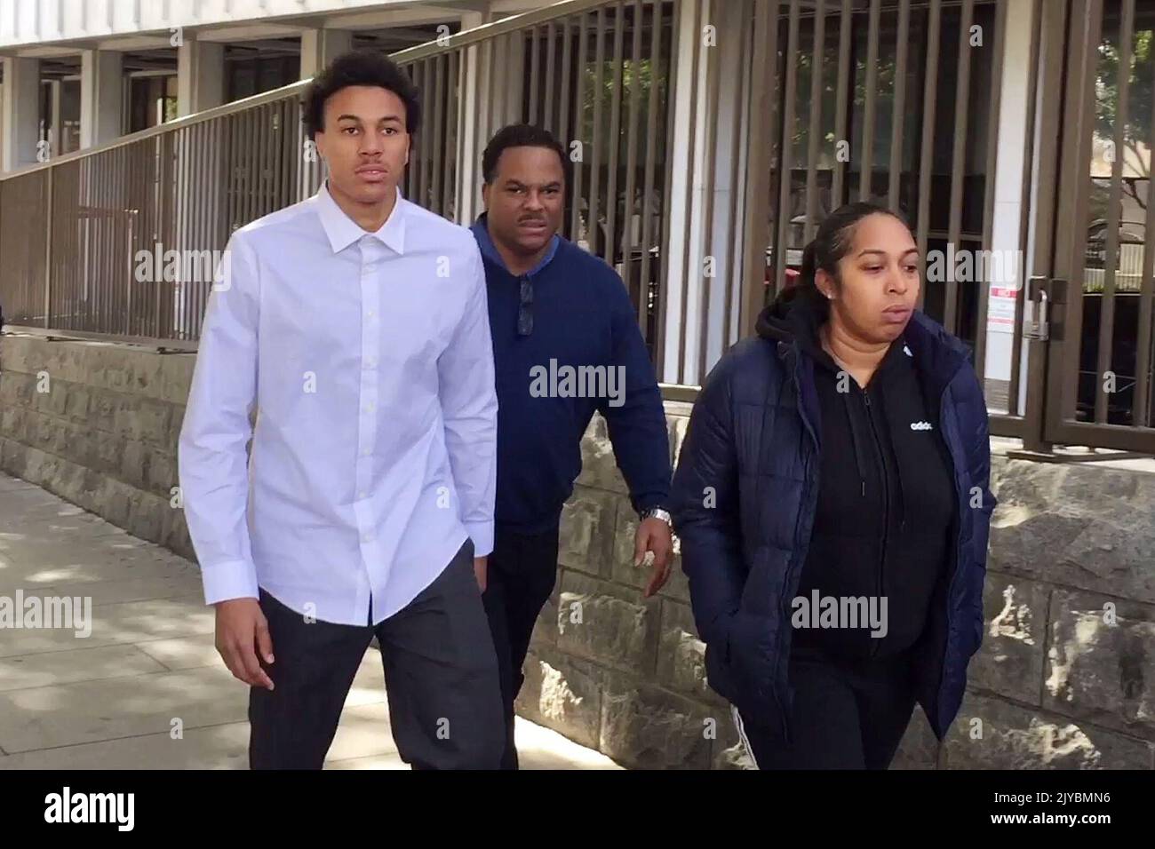 Kristopher Smith (left) leaves a Los Angeles court after pleading ...