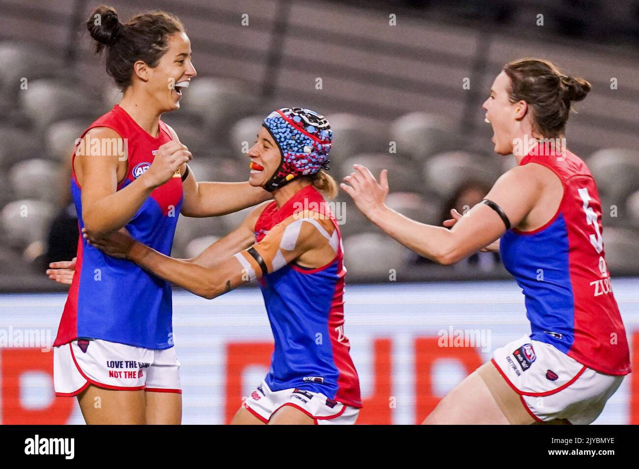 Jacqueline Parry of the Demons celebrates kicking a goal with her ...