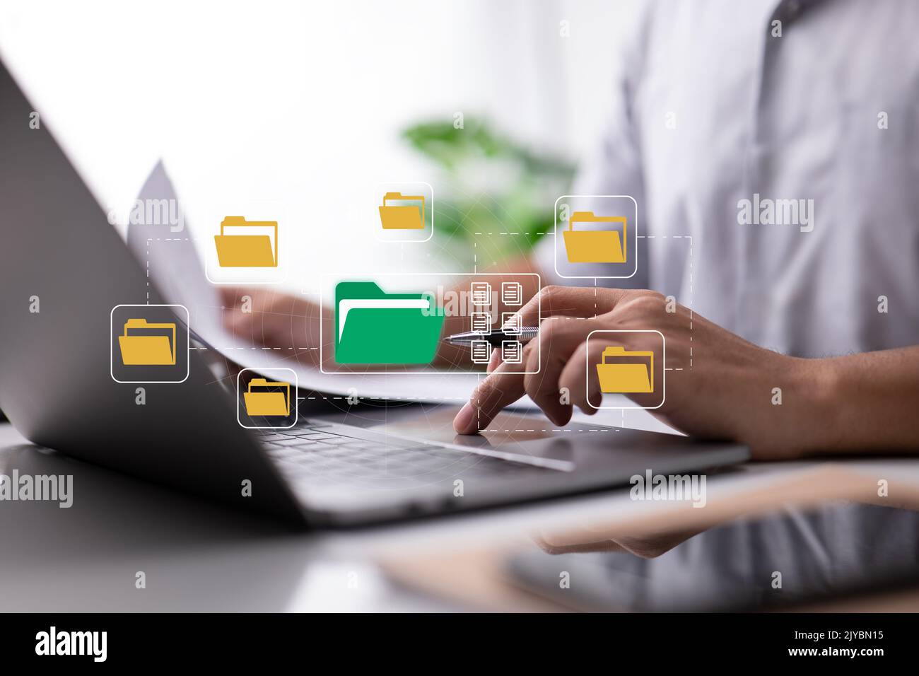 Paperless office idea based on electronic documents. A businessman ...